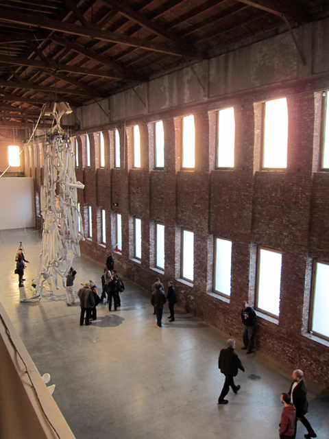 A Colossal Inflatable Robot Opens Its Arms Into a Portal