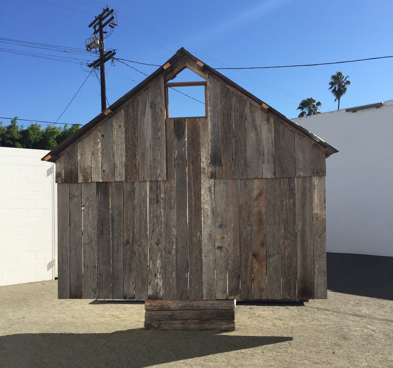 A Deconstructed Hunting Cabin Filled with Fabricated Memories