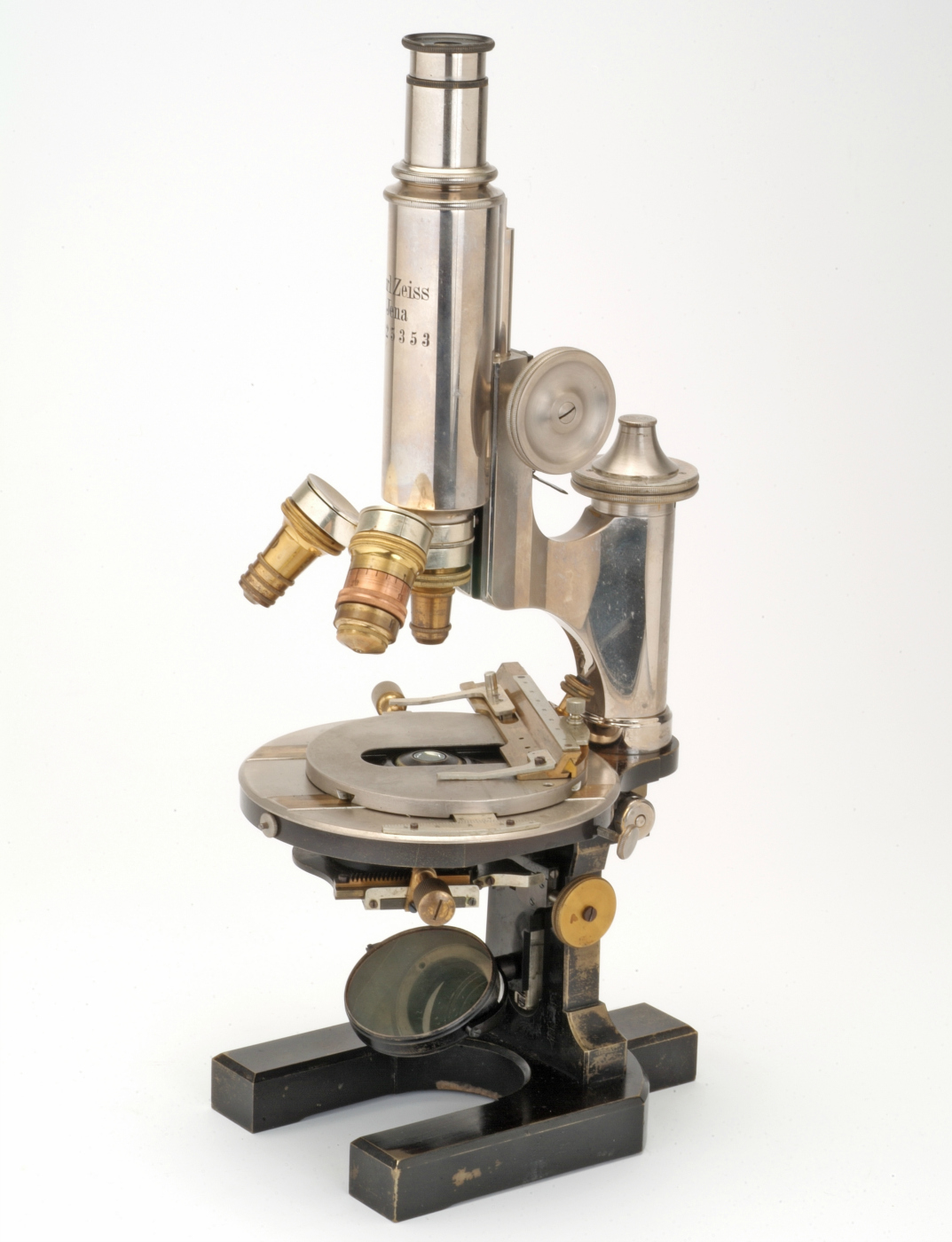 Glimpsing the Evolution of Glass Lenses in Three Centuries of Microscopes